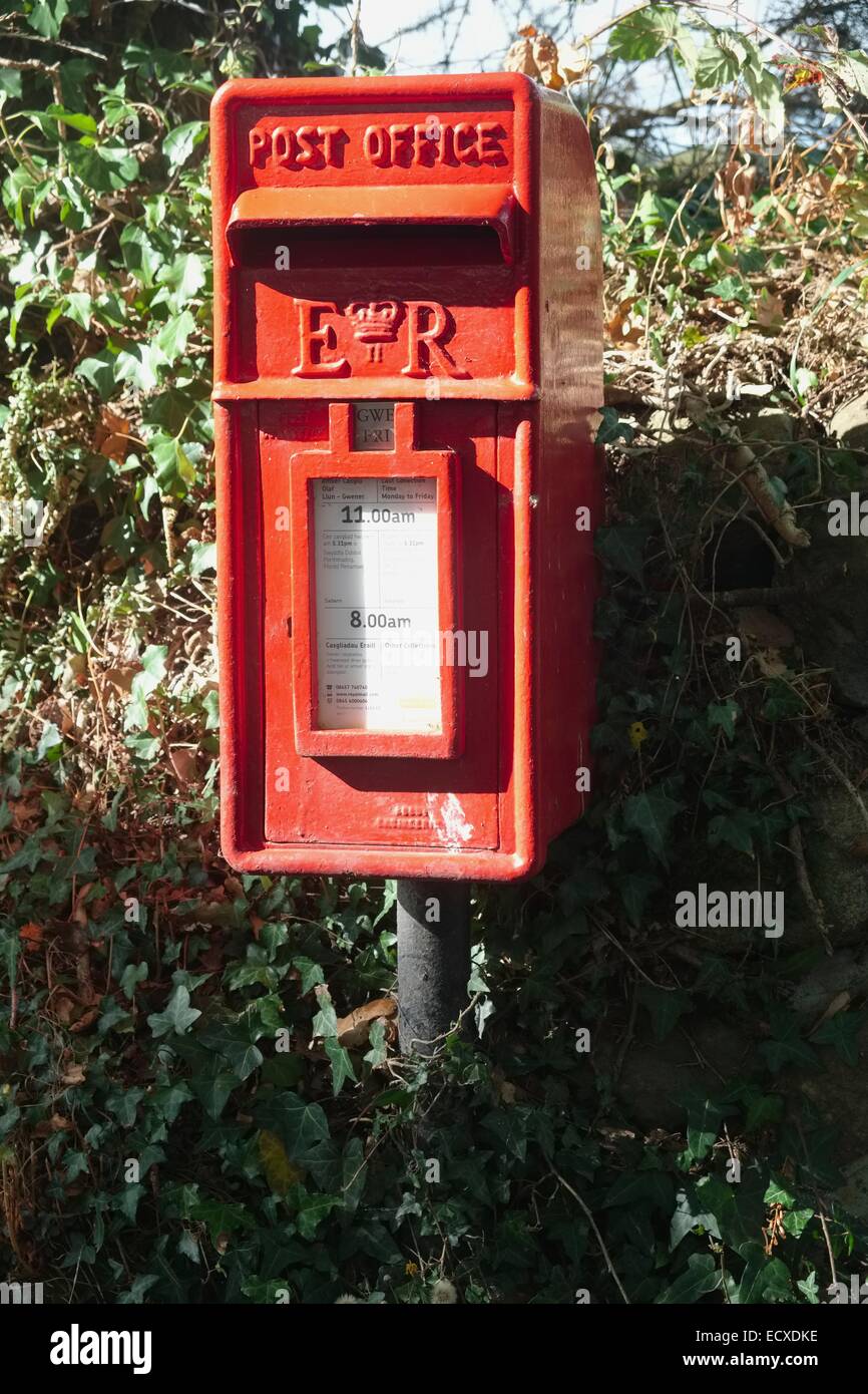 A traditional style pedestal post box in a Welsh country lane Stock ...