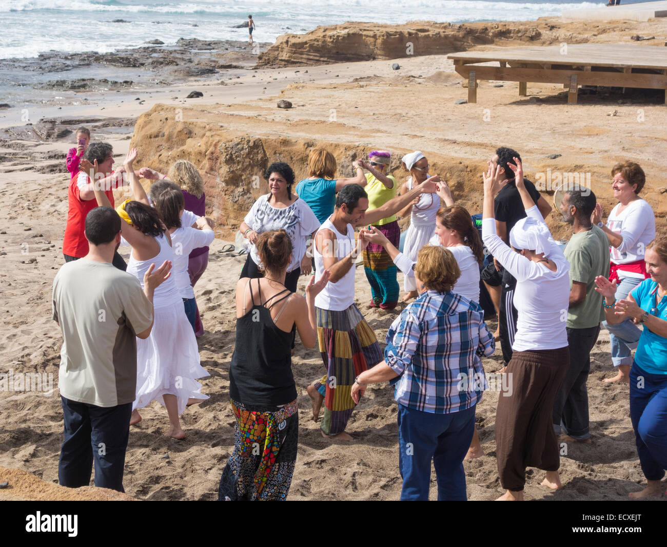 Winter Solstice celebrations on beach in Spain Stock Photo - Alamy