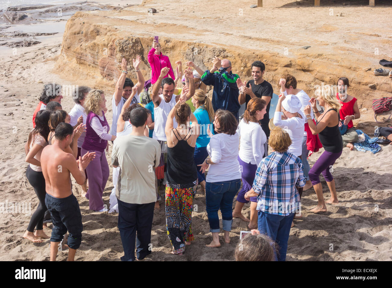 Winter Solstice celebrations on beach in Spain Stock Photo - Alamy