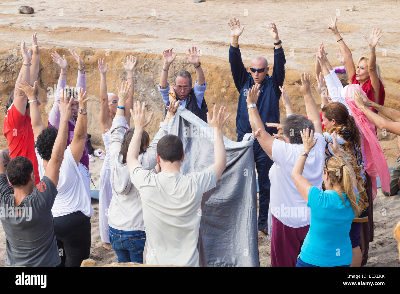 Winter Solstice celebrations on beach in Spain Stock Photo - Alamy
