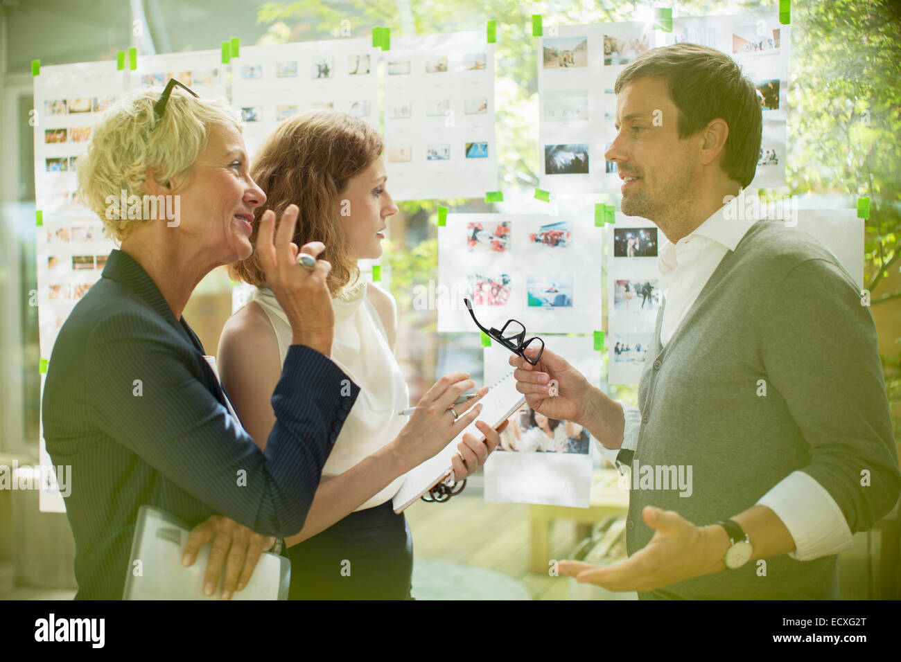 Business people talking in office Stock Photo - Alamy