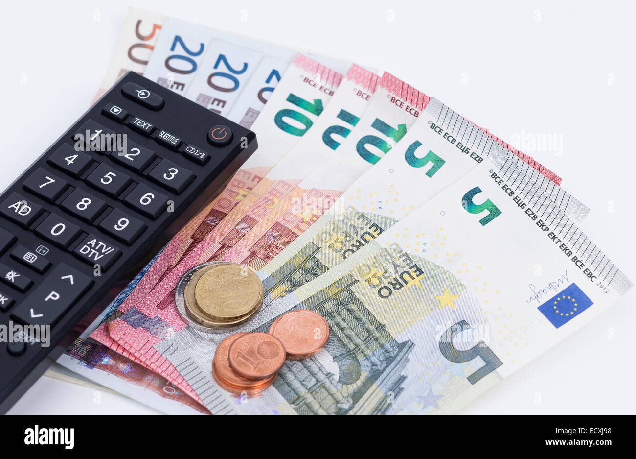 TV-Remote control and money isolated Stock Photo - Alamy