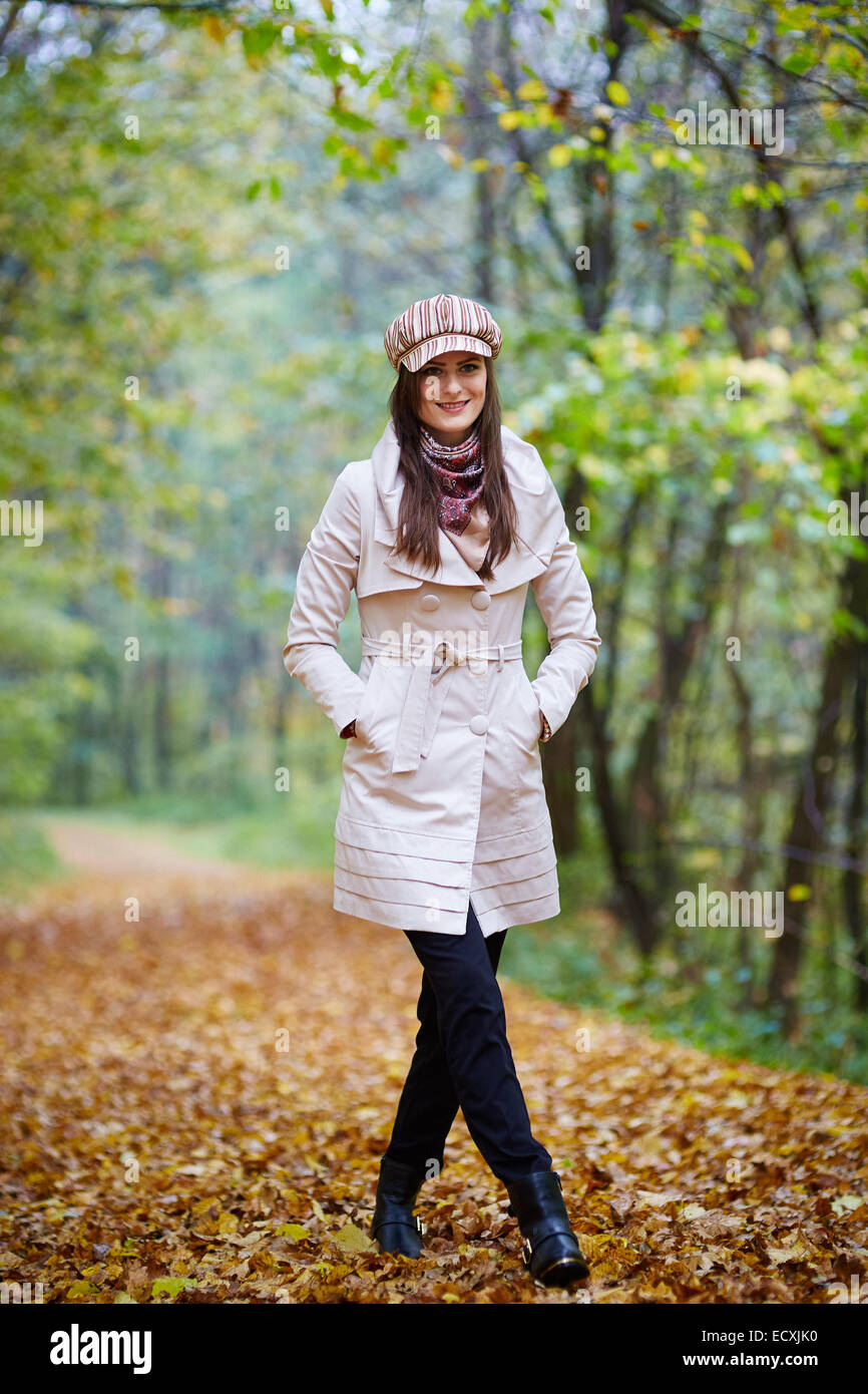 Beautiful young woman walking outdoor in the forest Stock Photo - Alamy
