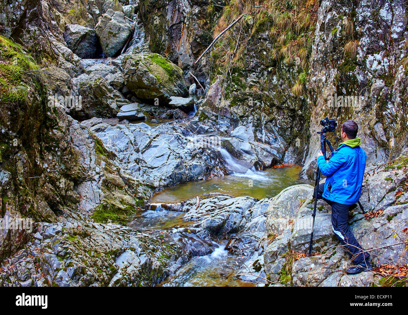 Professional nature photographer shooting landscapes in a canyon Stock ...