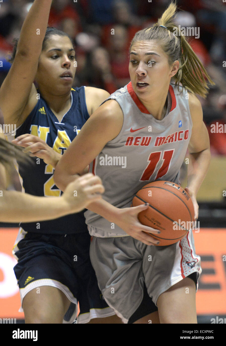 Usa. 21st Dec, 2014. SPORTS -- UNM's Alexa Chavez, 11, drives around ...