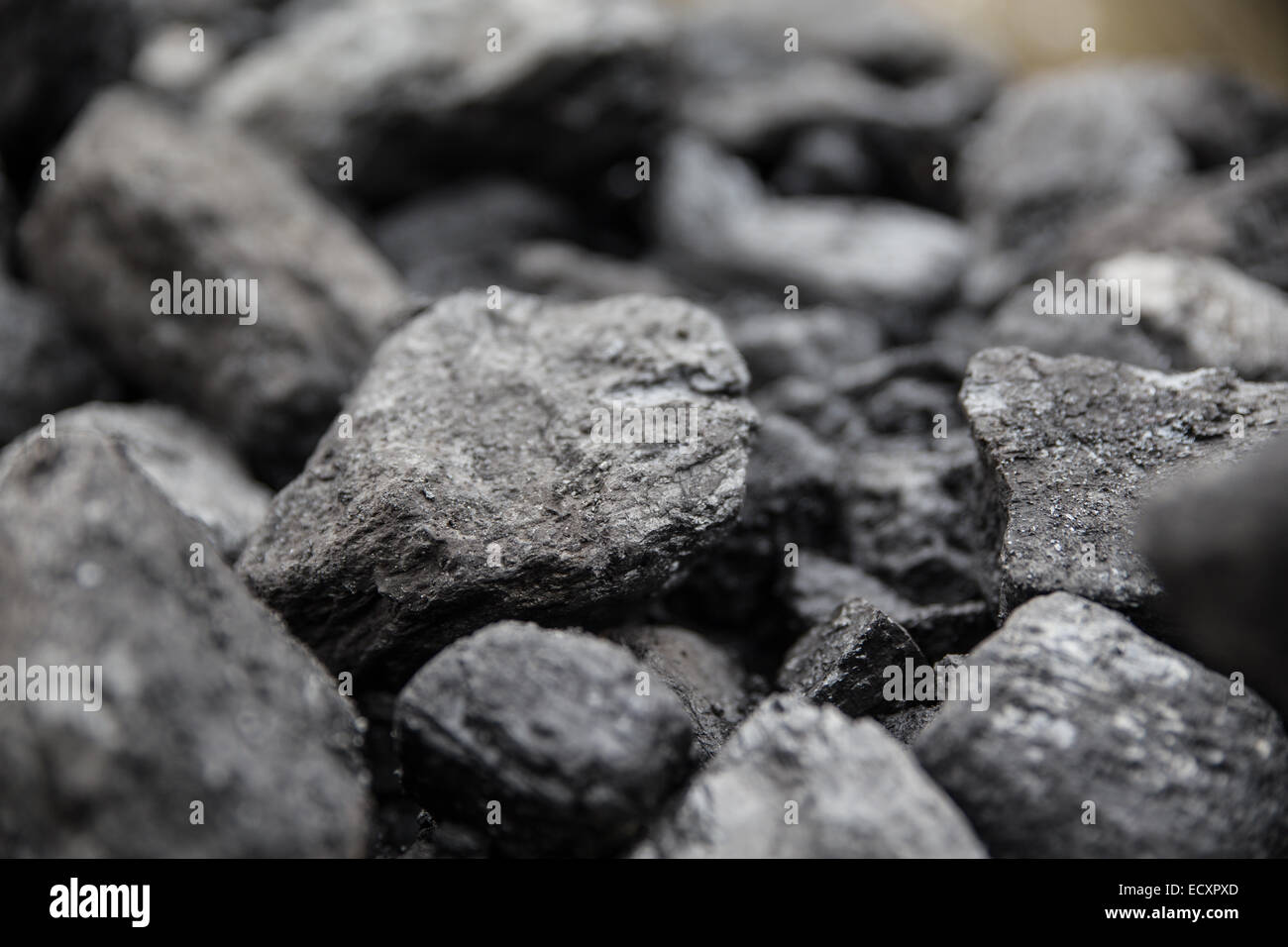 Shallow depth of field photo of lumps of coal piled up Stock Photo - Alamy