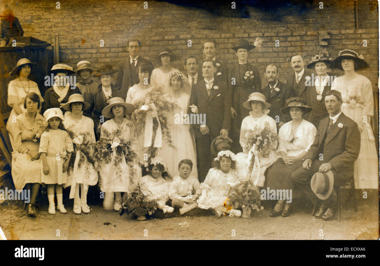 Circa 1920 Sepia posed group photograph of extended families standing ...