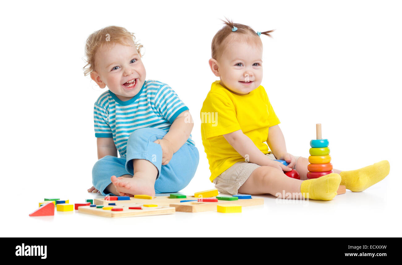 Adorable kids playing educational toys isolated Stock Photo - Alamy