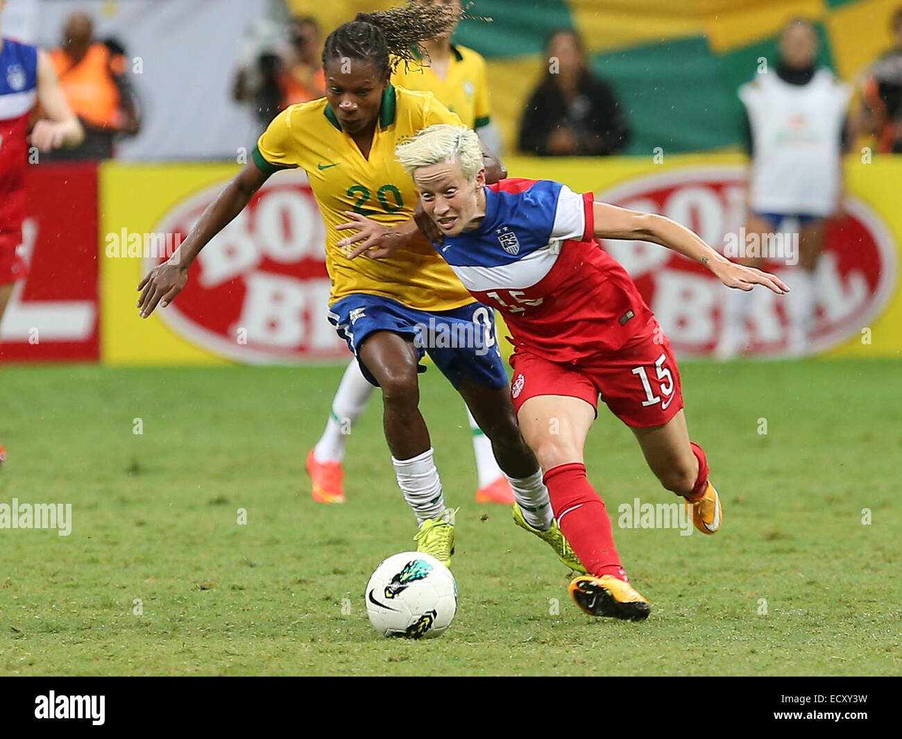 Brasilia, Brazil. 21st Dec, 2014. Megan Rapinoe (R) of the United ...