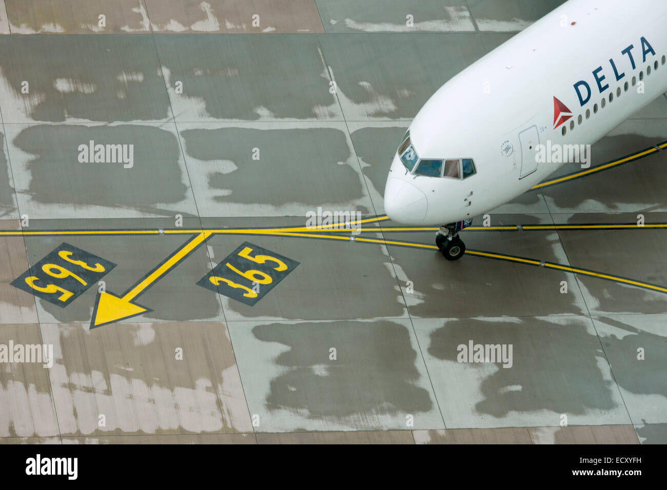 Aerial view (from control tower) of Delta airliner at London Heathrow ...