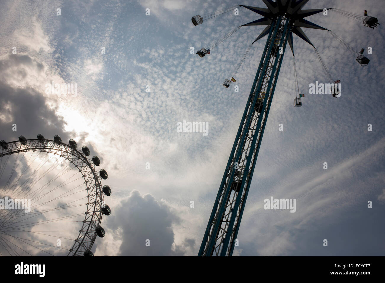 Rising circular fairground ride with EU member flags and Millennium ...