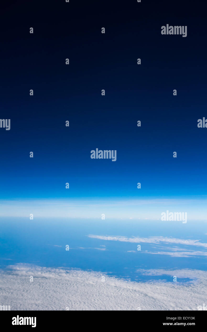 Over blue sky and clouds background hi-res stock photography and images ...