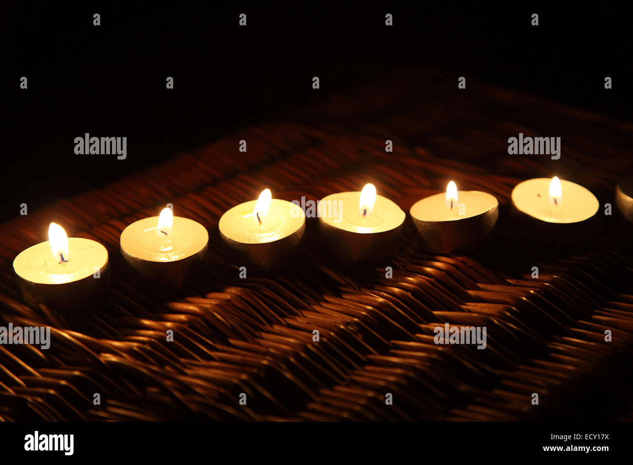 Igniting candles hi-res stock photography and images - Alamy