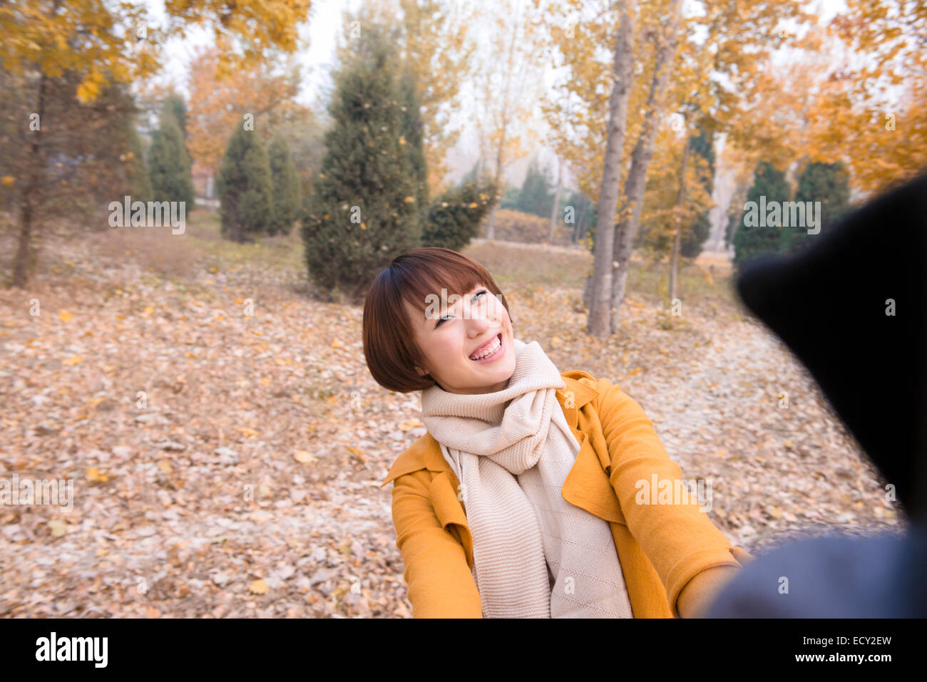 Young couple spinning Stock Photo - Alamy