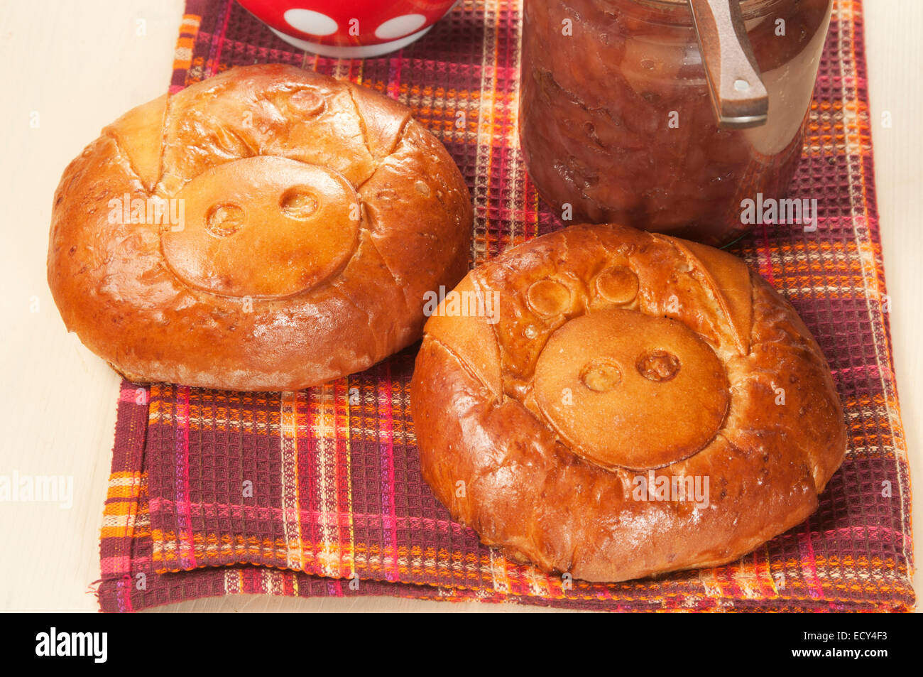 "Pig" pies with apple jam and tea, closeup Stock Photo - Alamy