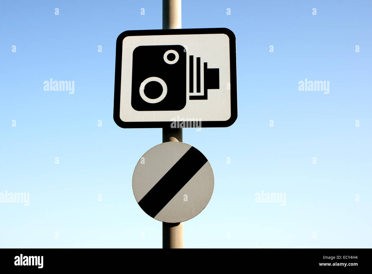 Speed camera warning with the national speed limit sign in the United ...