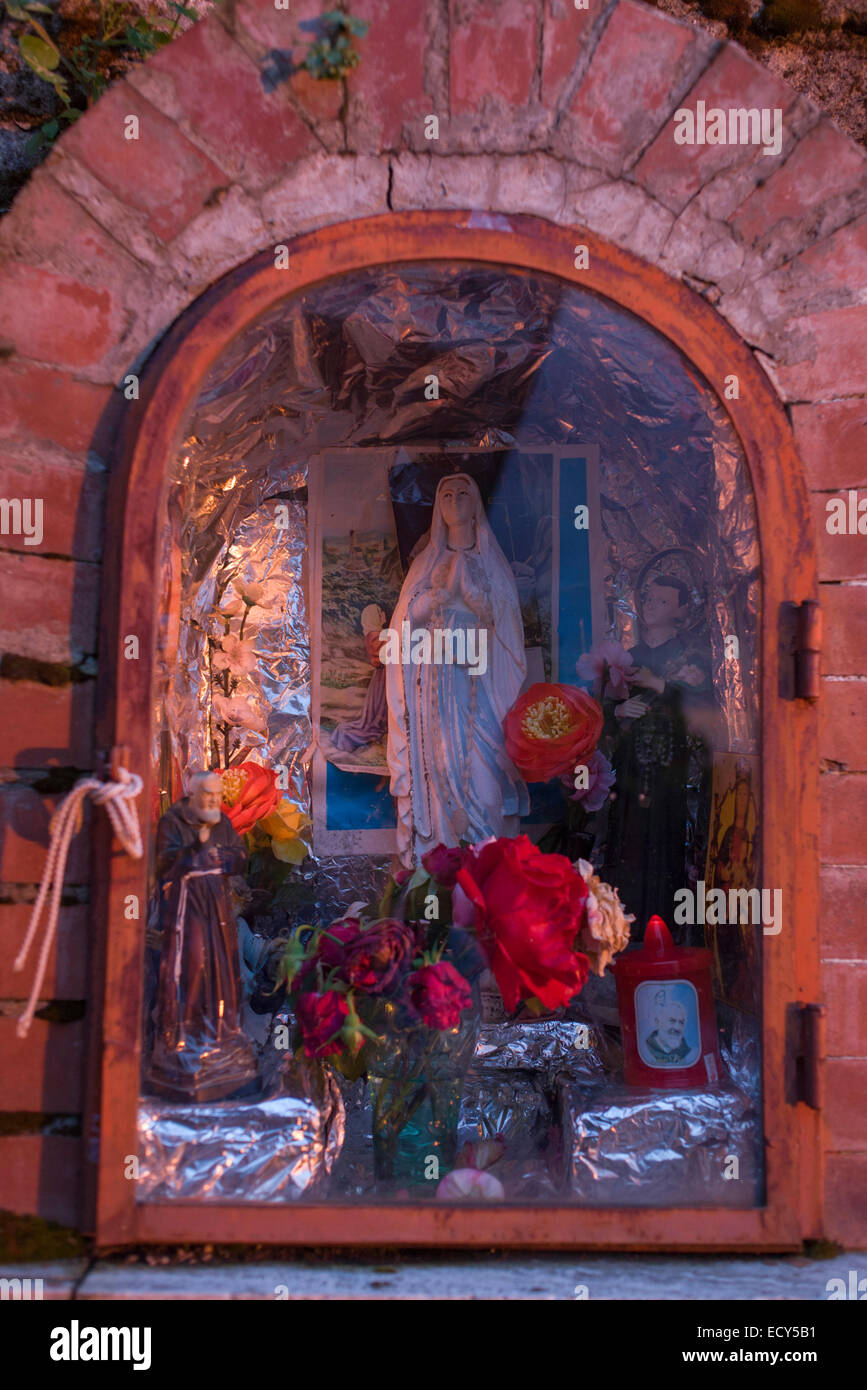 Religious edicola (aedicula votiva) shrine dedicated to the Madonna ...