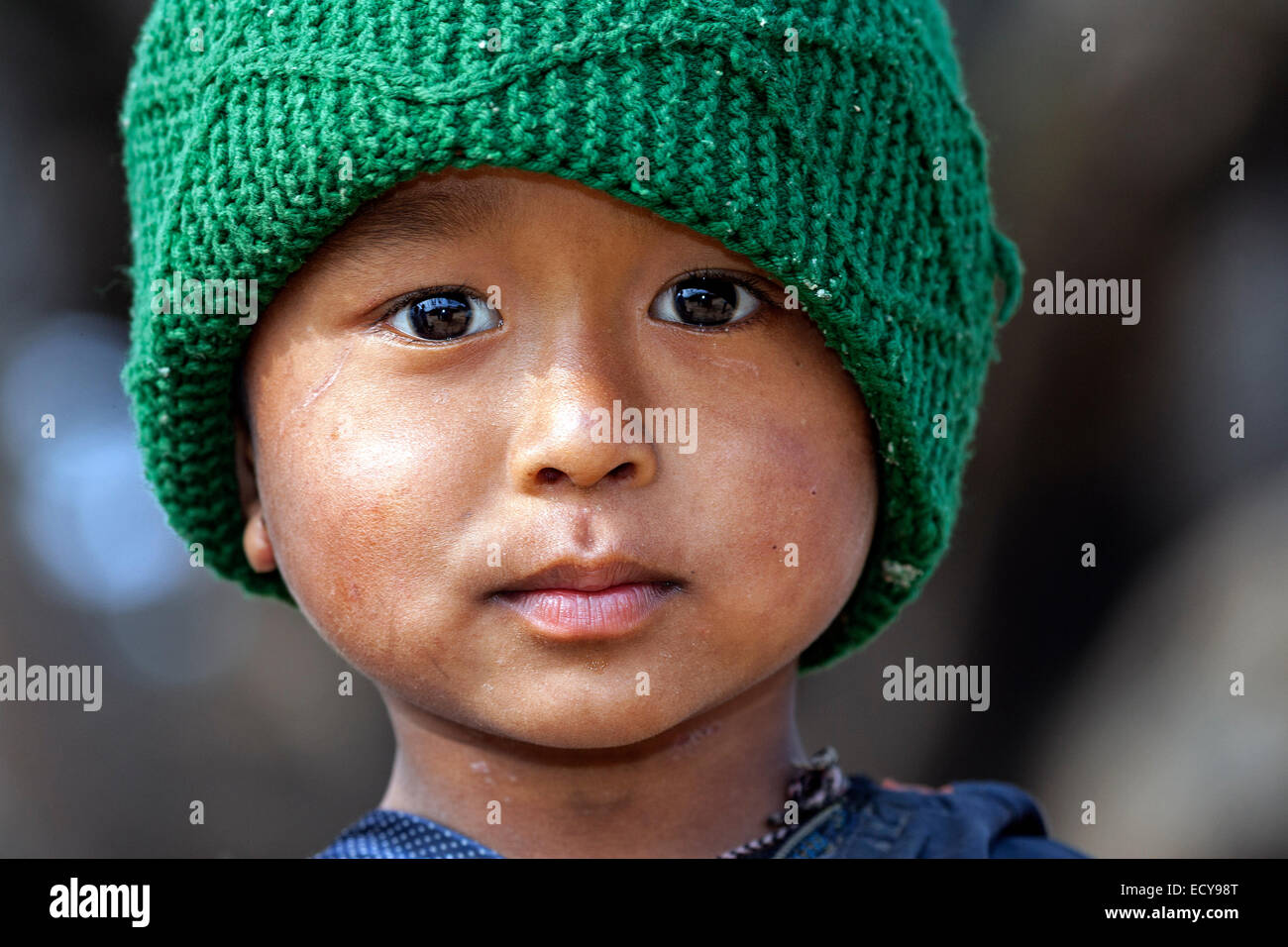 Nepalese boy with a green cap, portrait, Bandipur, Nepal Stock Photo ...
