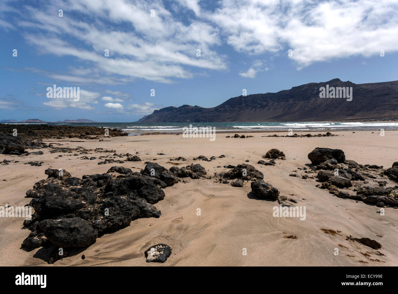 Famara beach, Playa de Famara, in the back Risco de Famara, Lanzarote ...