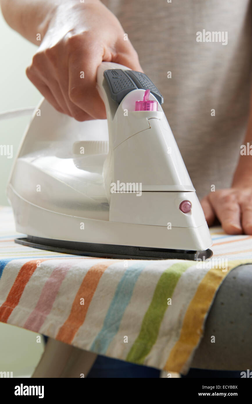 Close Up Of Woman Ironing Laundry Stock Photo - Alamy
