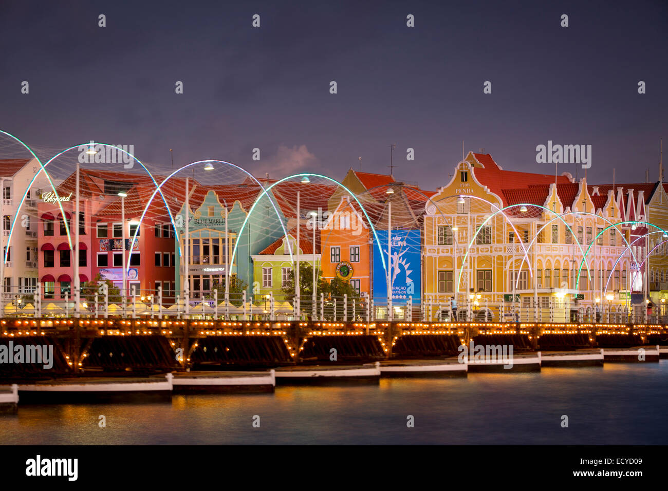 Colorful Dutch architecture lines the wharf at Willemstad, Curacao ...