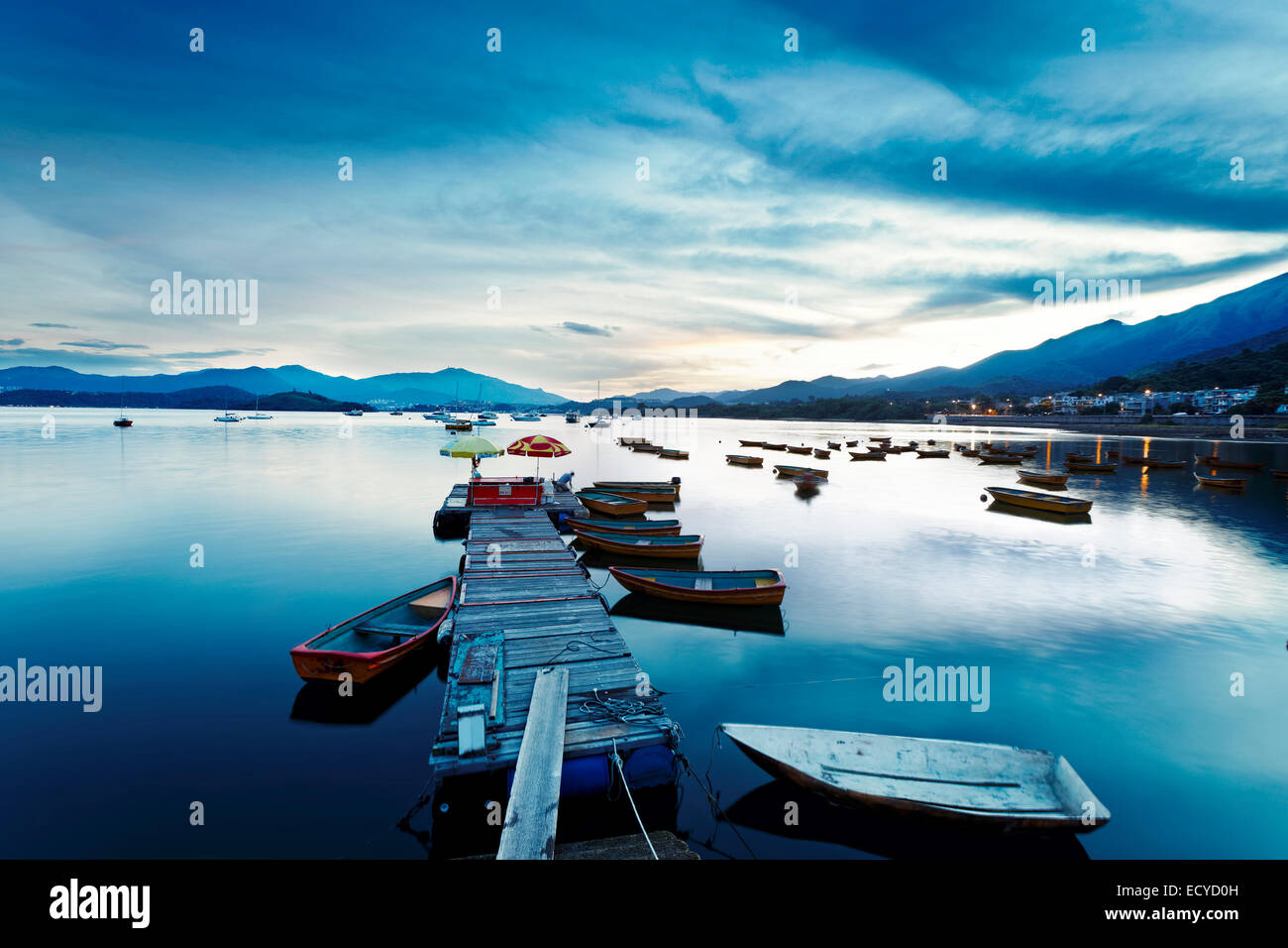 Boat pier at sunset. Beautiful landscape Stock Photo - Alamy