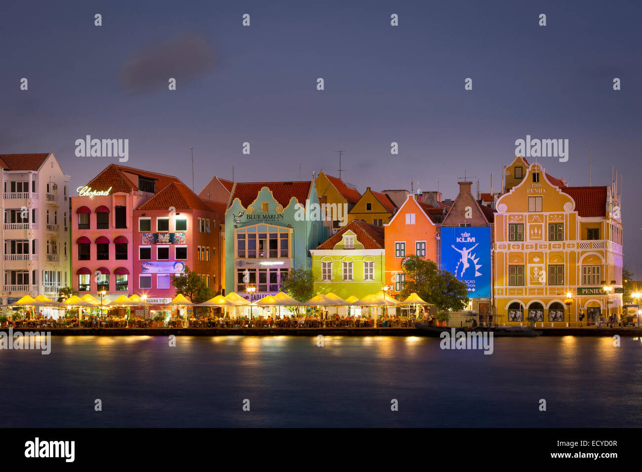 Colorful Dutch architecture lines the wharf at Willemstad, Curacao ...