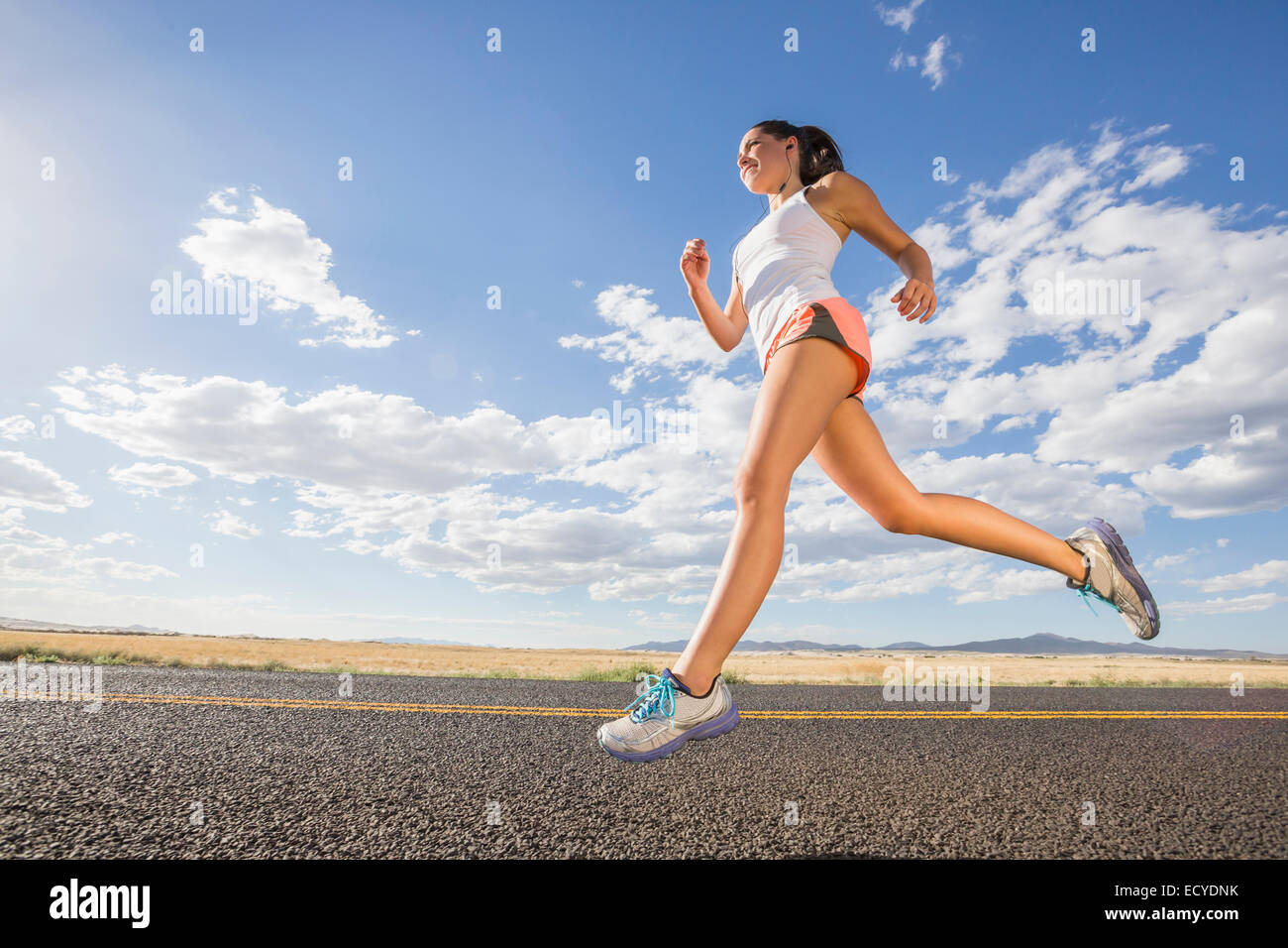 Mid Adult Woman Running Of Road High Resolution Stock Photography and ...