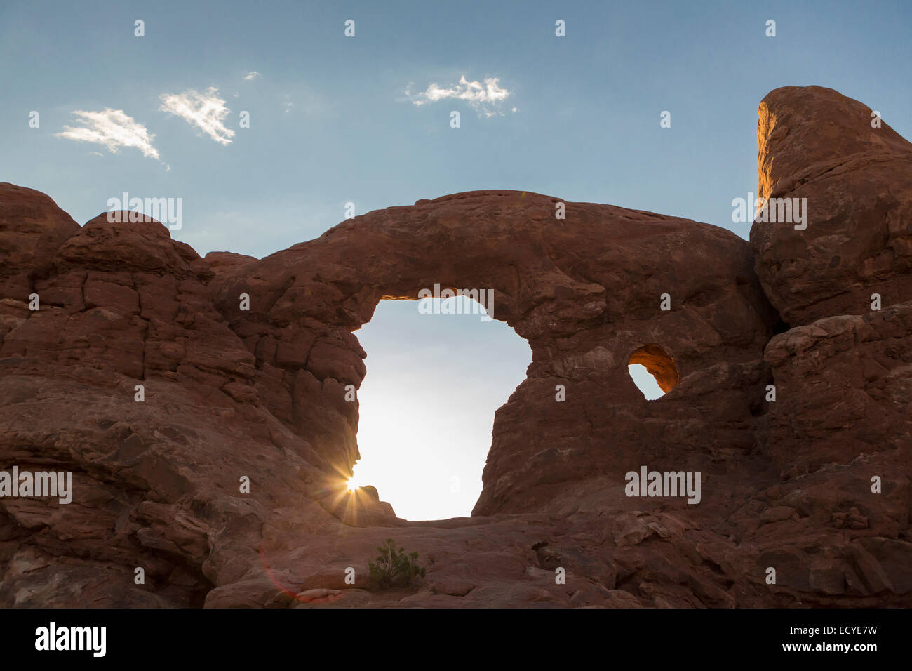 Low angle view of Turret Arch rock formation under blue sky, Arches ...