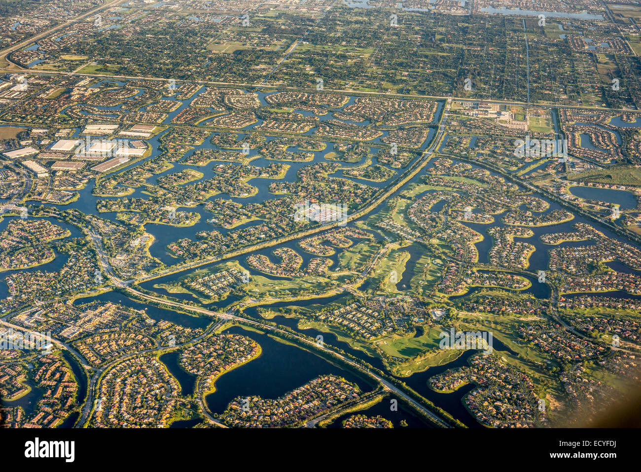 plane,flying,america,usa,aerial view,florida,houses,urban,suburbs,water ...