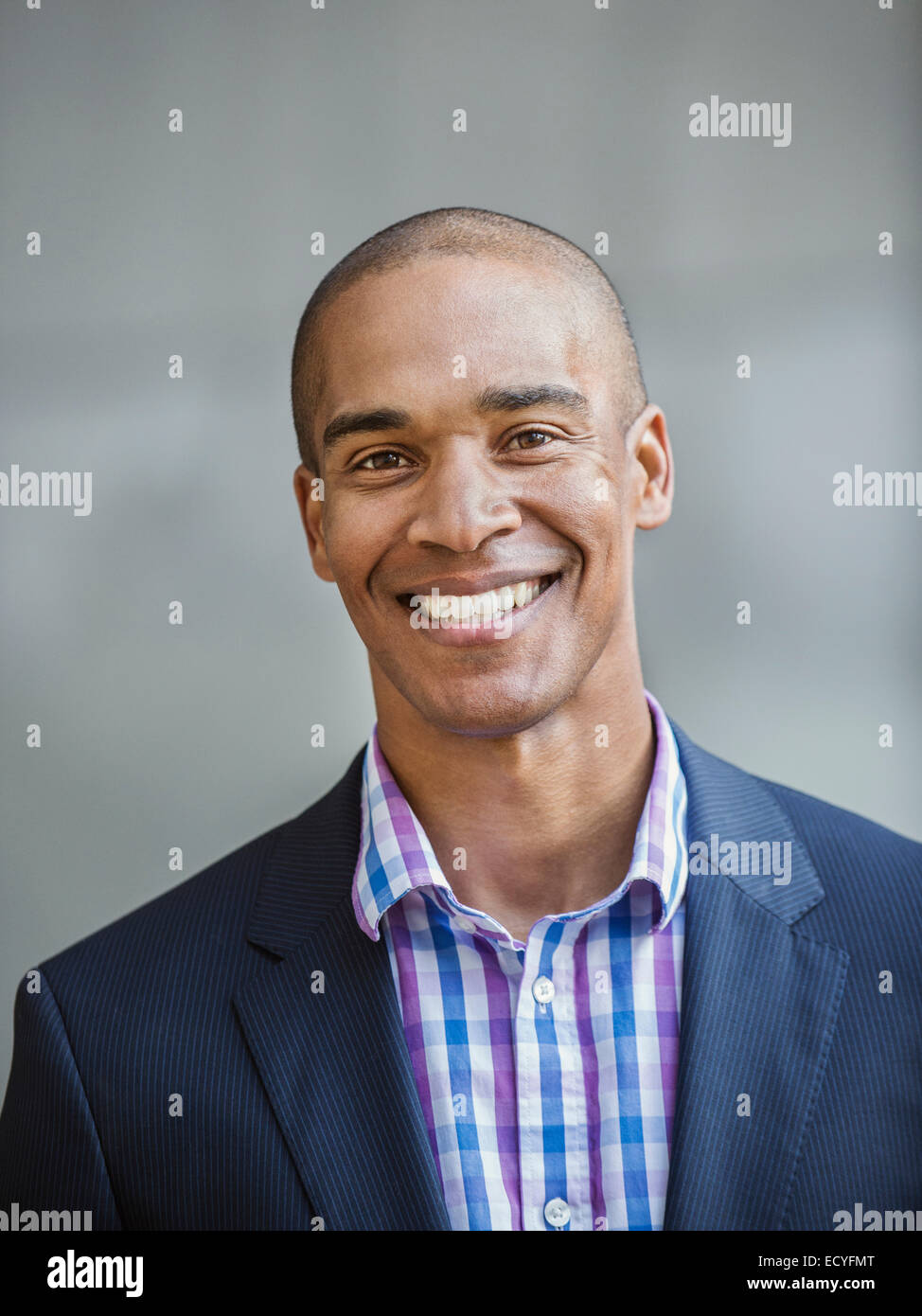 Black businessman smiling Stock Photo - Alamy