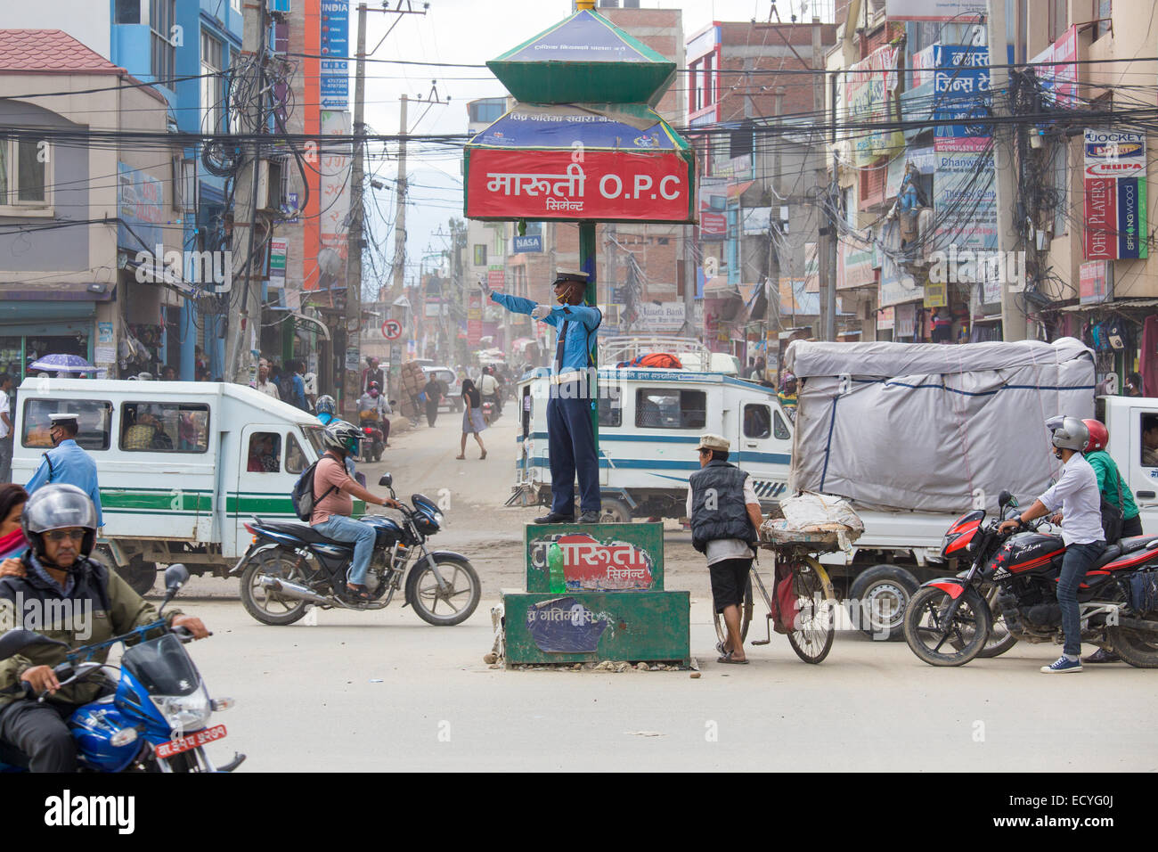 Directing traffic on a busy street in Kathmandu, Nepal Stock Photo - Alamy
