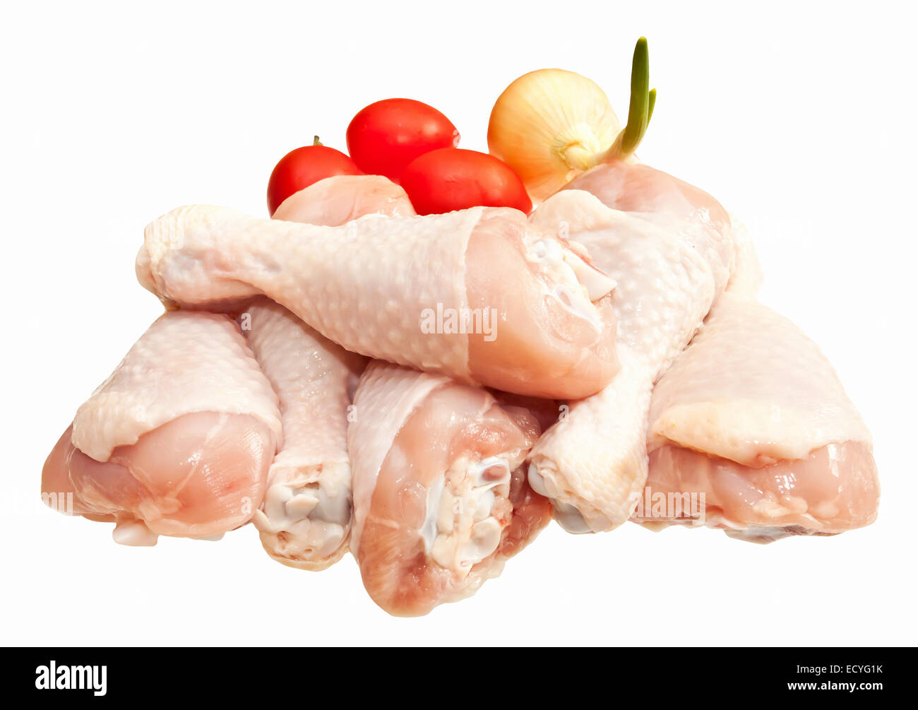 Raw chicken legs with vegetables, isolated on white background Stock ...