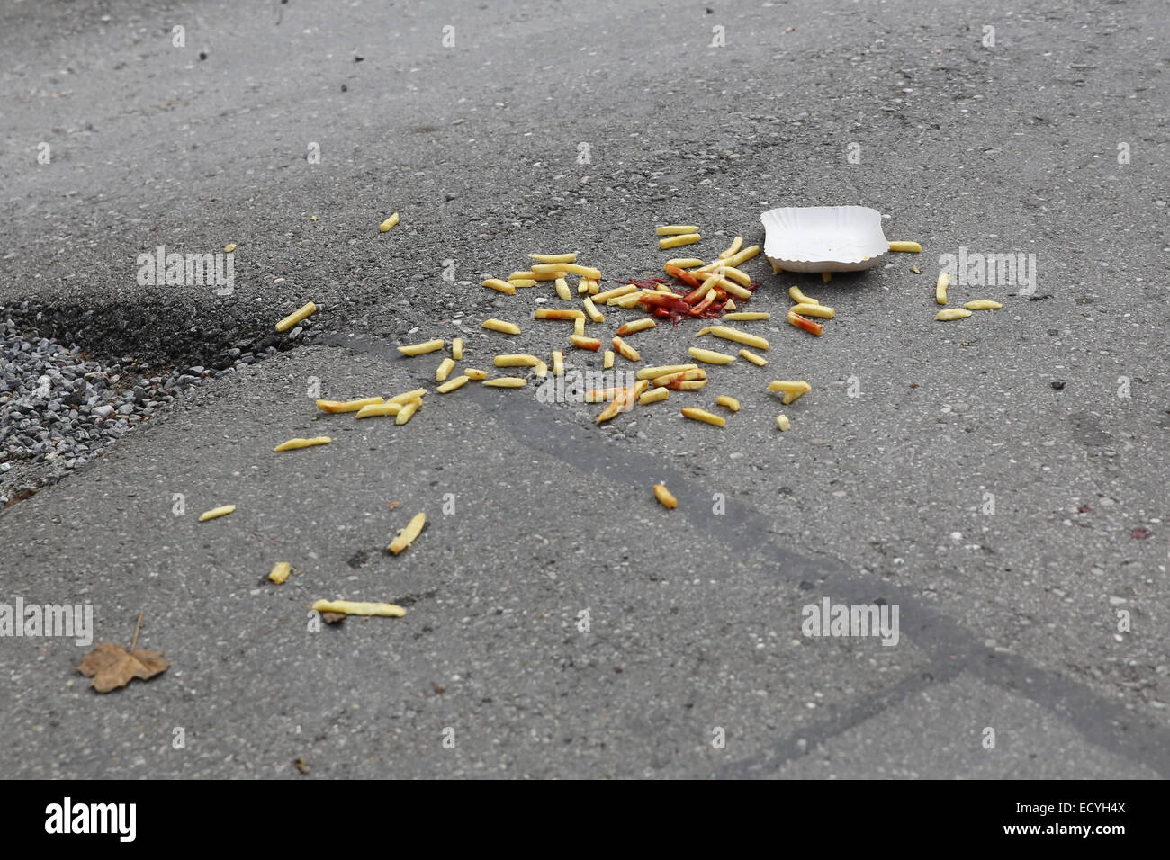 spilled drop fries ground careless waste dirty mess Stock Photo - Alamy