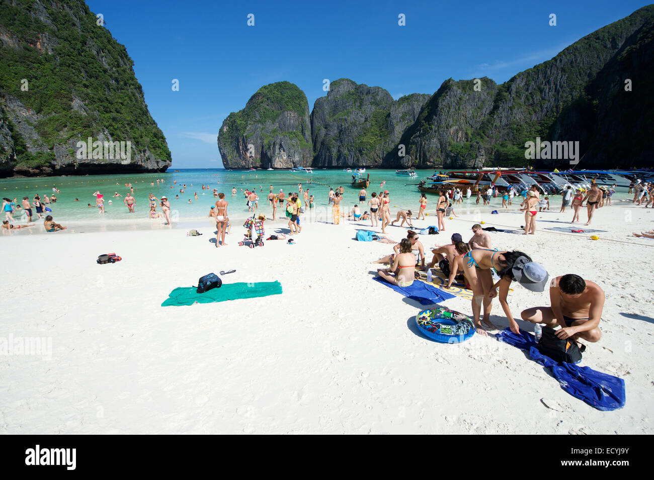 MAYA BAY, THAILAND - NOVEMBER 12, 2014: Crowds of visitors enjoy a day ...