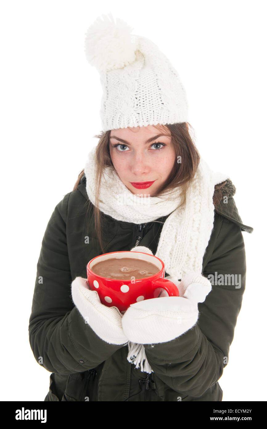 Portrait of a girl with winter coat mittens and cap and mug hot ...