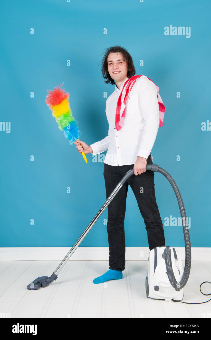 Man vacuum cleaner hi-res stock photography and images - Alamy