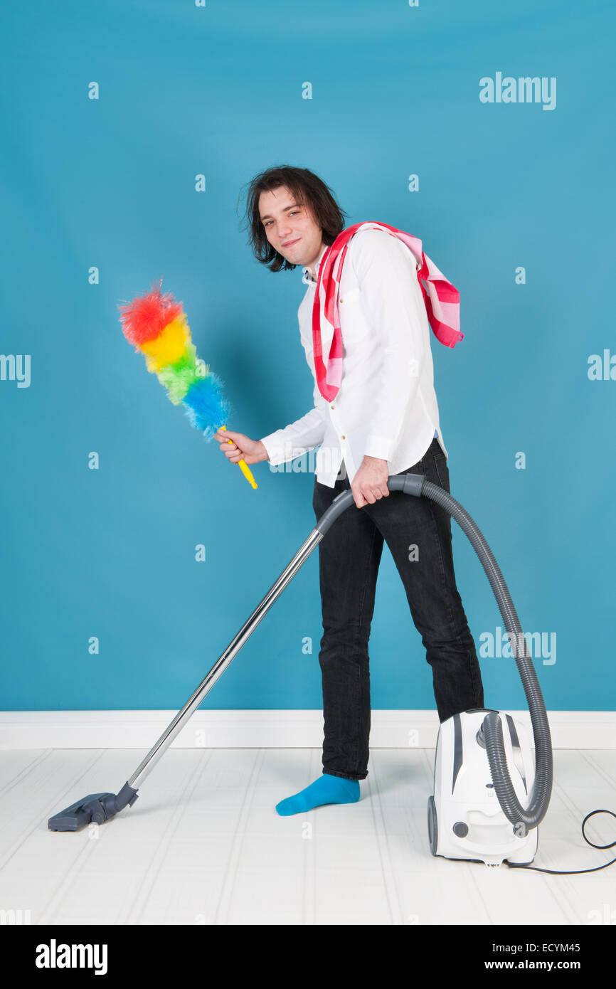 Man vacuum cleaner hi-res stock photography and images - Alamy