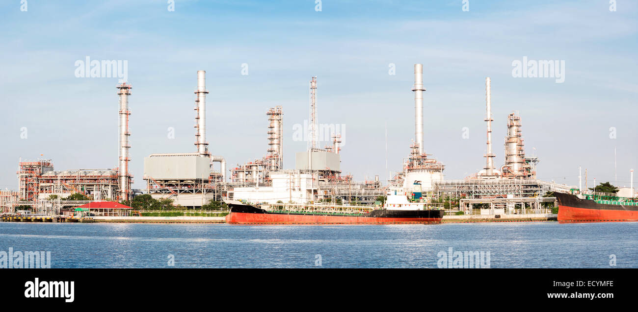 panorama landscape of Oil refinery plant along river with tanker Stock ...