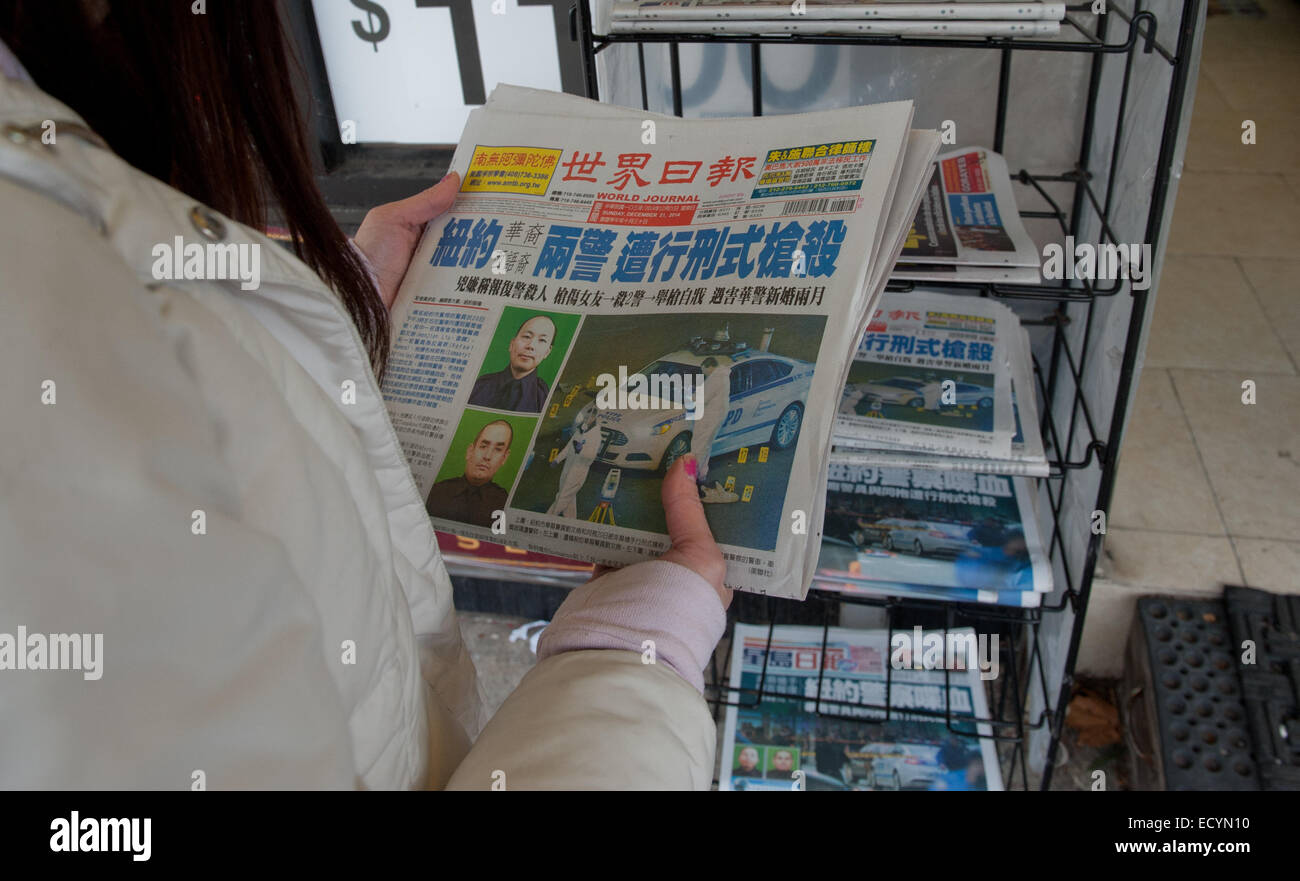 Brooklyn, New York, USA. 21st Dec, 2014. An unidentified neighbor looks ...