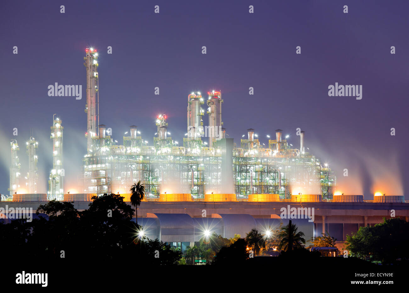Oil Refinery plant with Power generator at dusk Stock Photo - Alamy