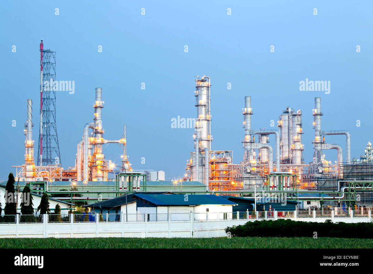Architecture of Oil Refinery Plant with distillation tower with Sunset ...