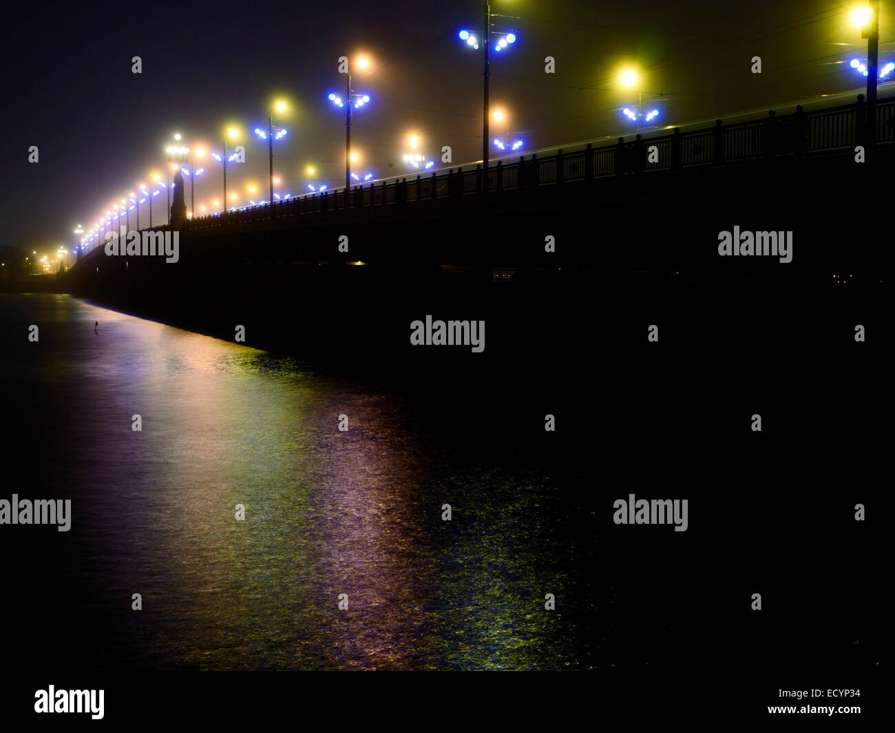 Stone Bridge lights in fog ,Riga Stock Photo - Alamy