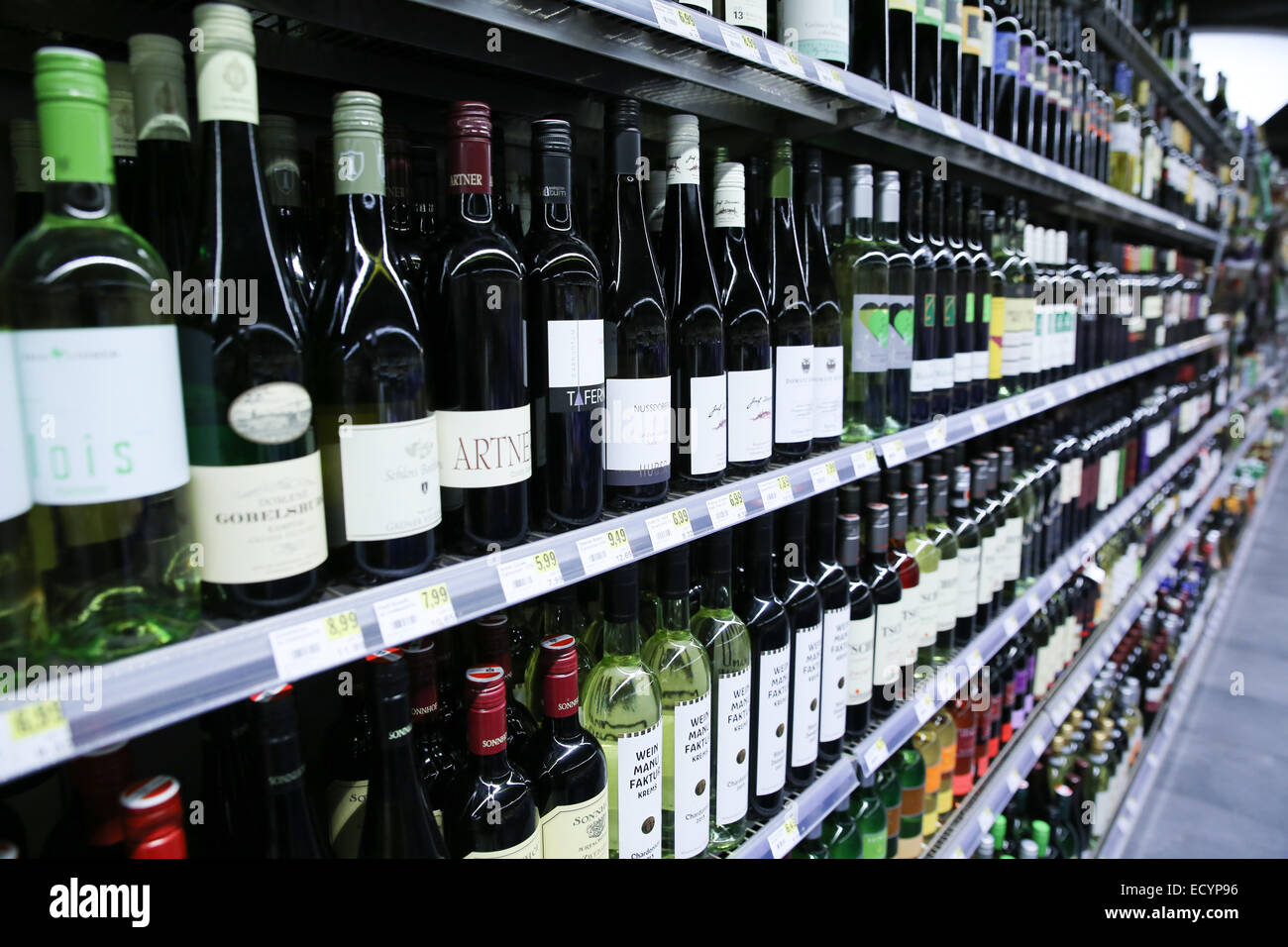 wine section inside Europe grocery store supermarket Stock Photo - Alamy