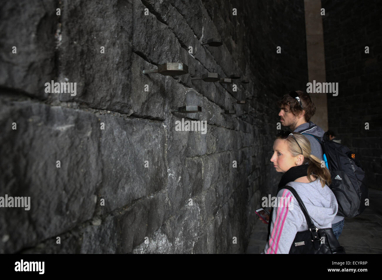tourist inside Jewish Memorial Dachau concentration camp memorial site ...