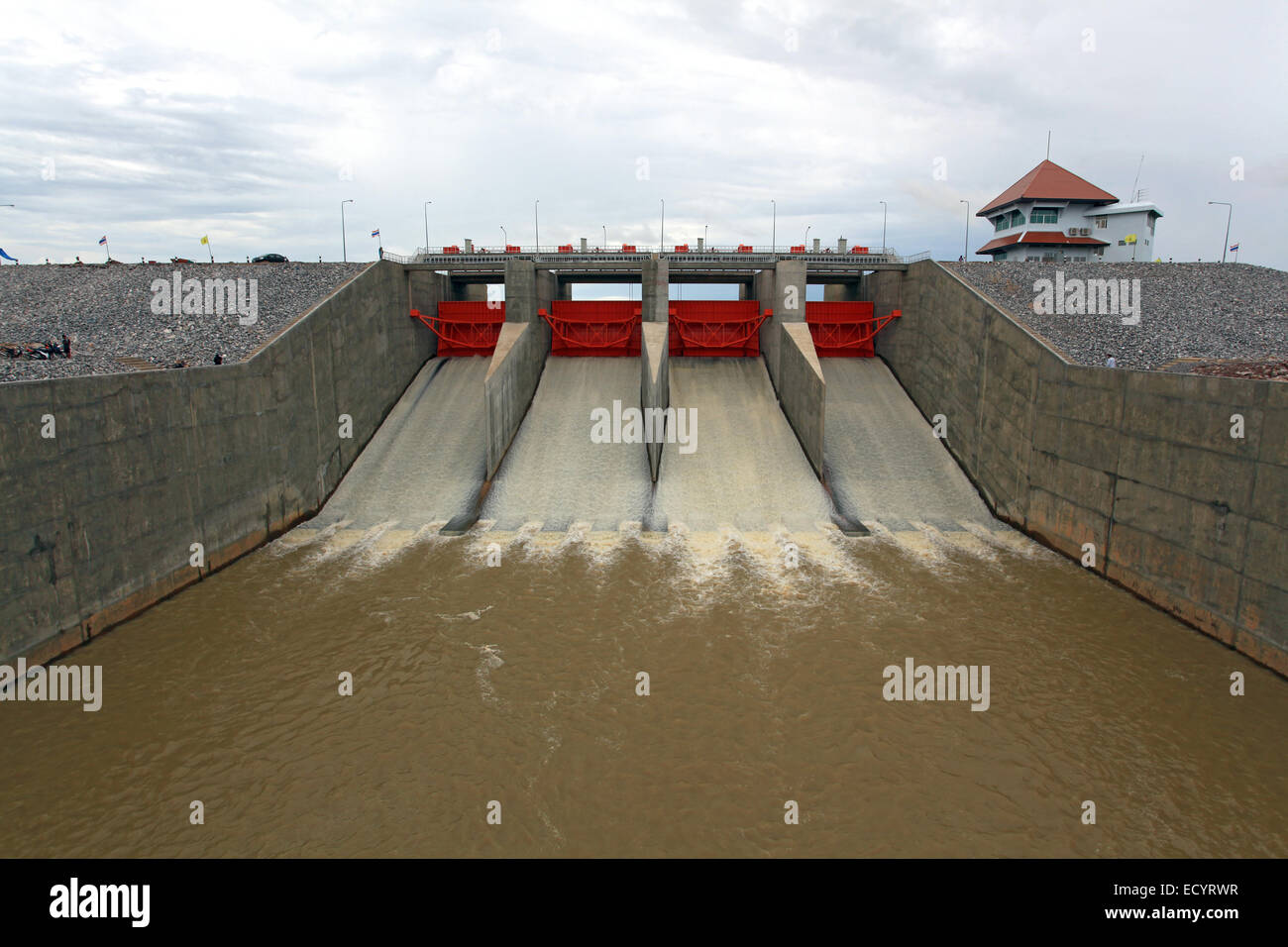 Water pouring through the water gates at dam Stock Photo - Alamy