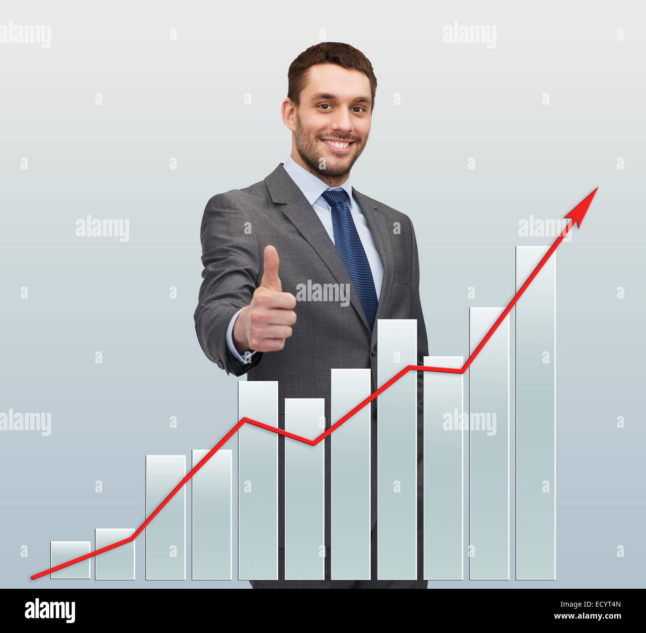 smiling businessman with graph showing thumbs up Stock Photo - Alamy