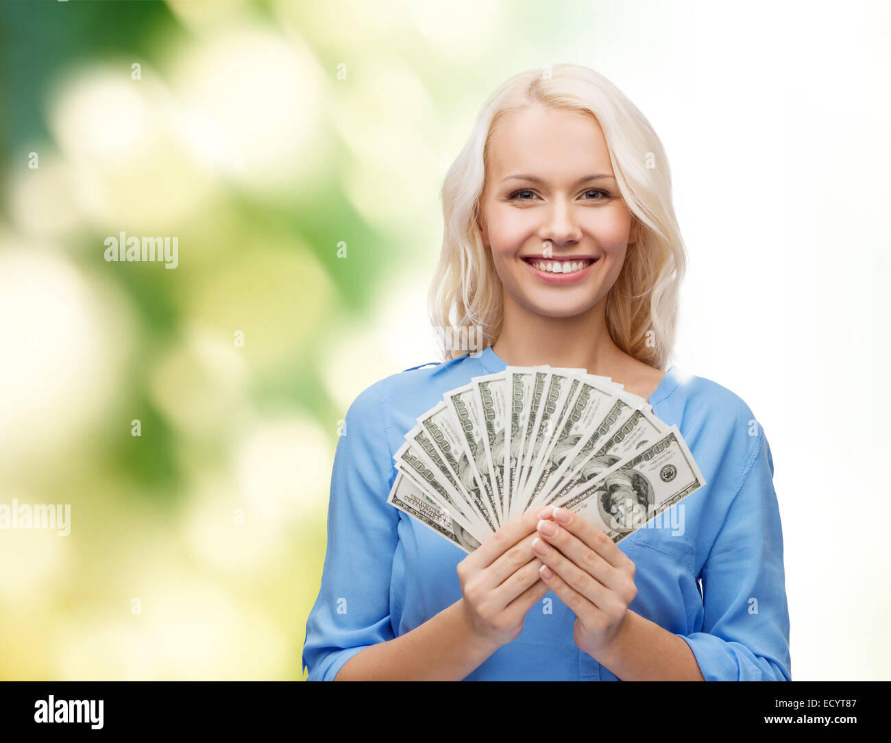 smiling young woman with us dollar money Stock Photo - Alamy