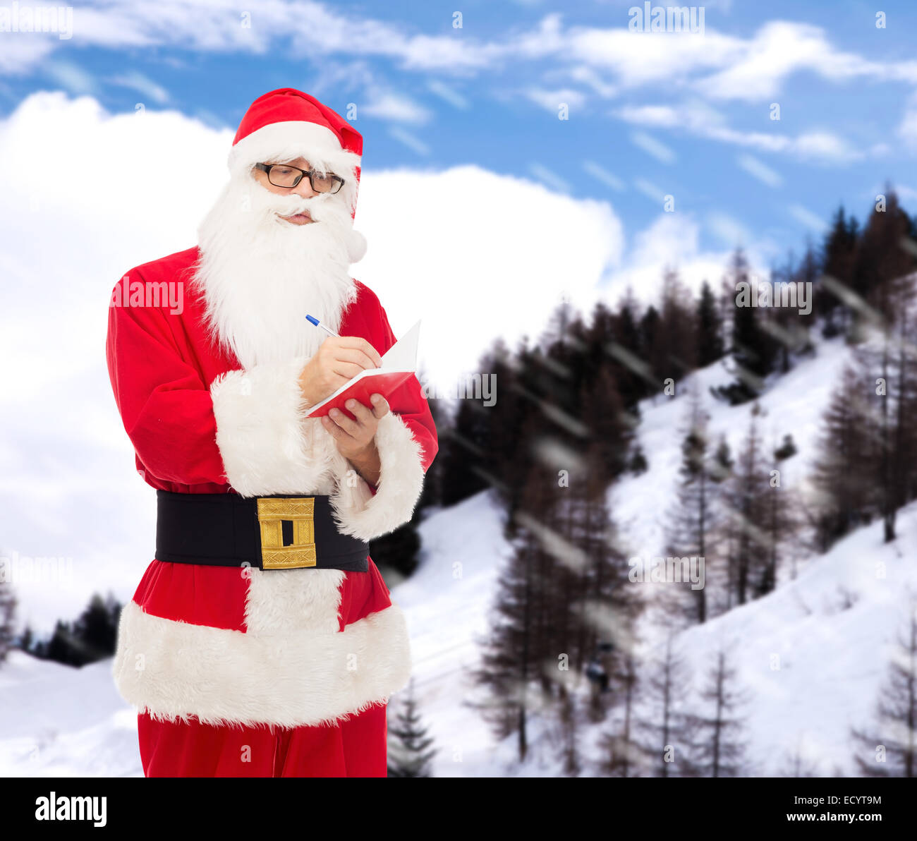 man in costume of santa claus with notepad Stock Photo - Alamy