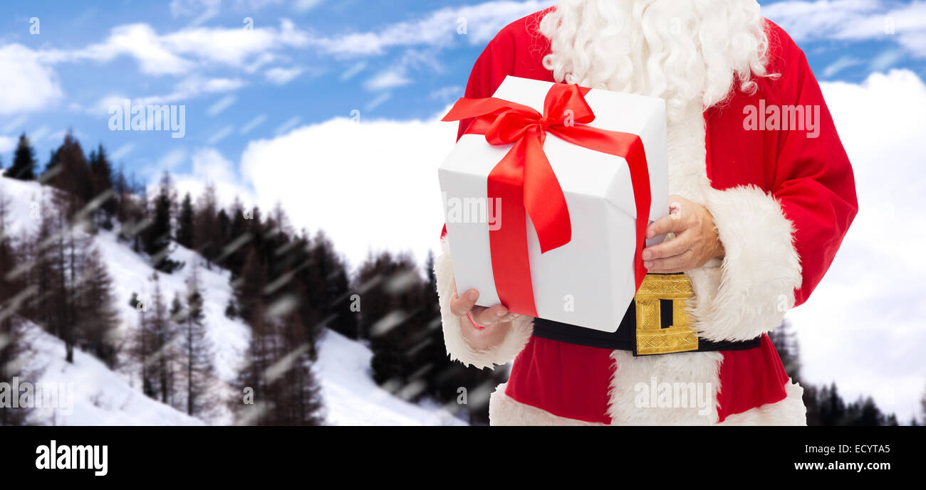 man in costume of santa claus with gift box Stock Photo - Alamy